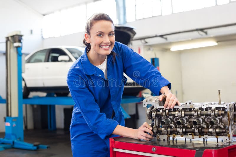 Mechanic Working on an Engine Stock Image - Image of service, indoors ...