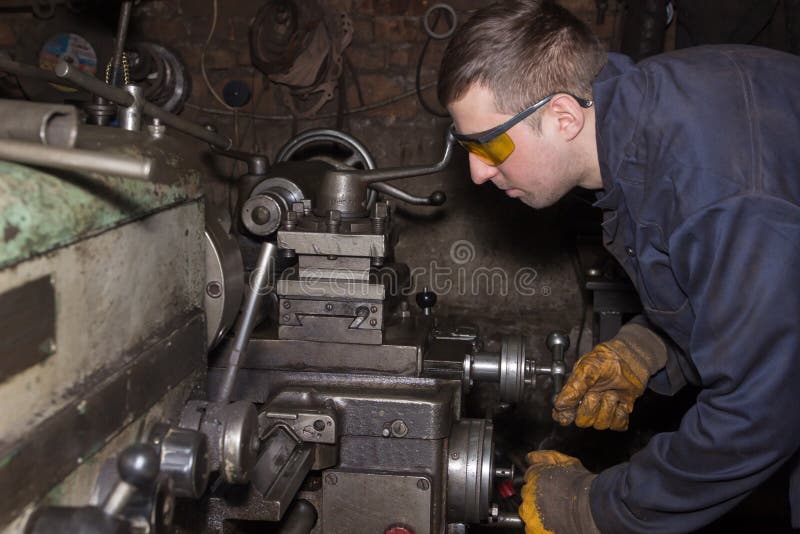 Mechanic is working stock photo. Image of mechanic, workshop - 75939148