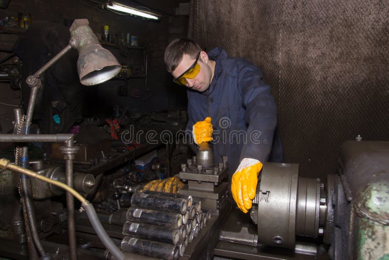 Mechanic is working stock image. Image of machine, manual - 75939155