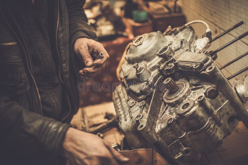 Mechanic Working with with Motorcycle Engine Stock Image - Image of ...