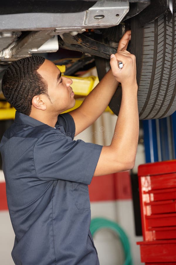 Mechanic at work stock image. Image of american, person - 7457681