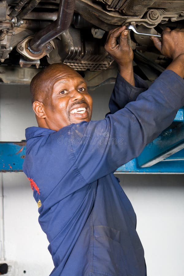 Mechanic at work stock image. Image of american, person - 7457681