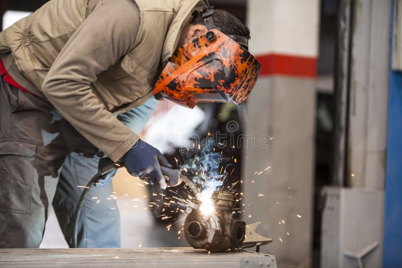 The Mechanic Works in the Workshop Editorial Stock Photo - Image of ...
