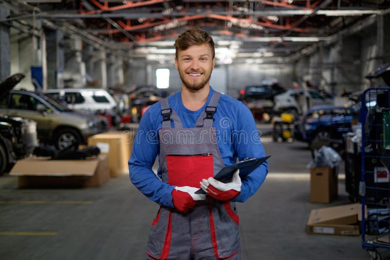 Mechanic in a workshop stock image. Image of garage, mechanic - 60535201