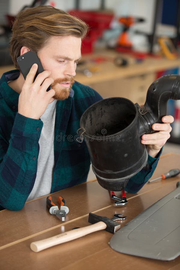 Mechanic in Workshop Ordering Parts Stock Image - Image of repairman ...