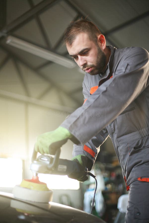 Mechanic in workshop. stock photo. Image of fabricate - 119568724