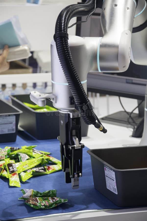 Mechanical Arm Robotic Arm in Production Editorial Photography - Image ... Mechanical Arm Robotic Arm in Production Editorial Photography - Image ...