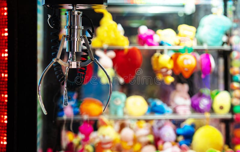 Mechanical Claw Game Machine. Stock Photo - Image of object, center ...