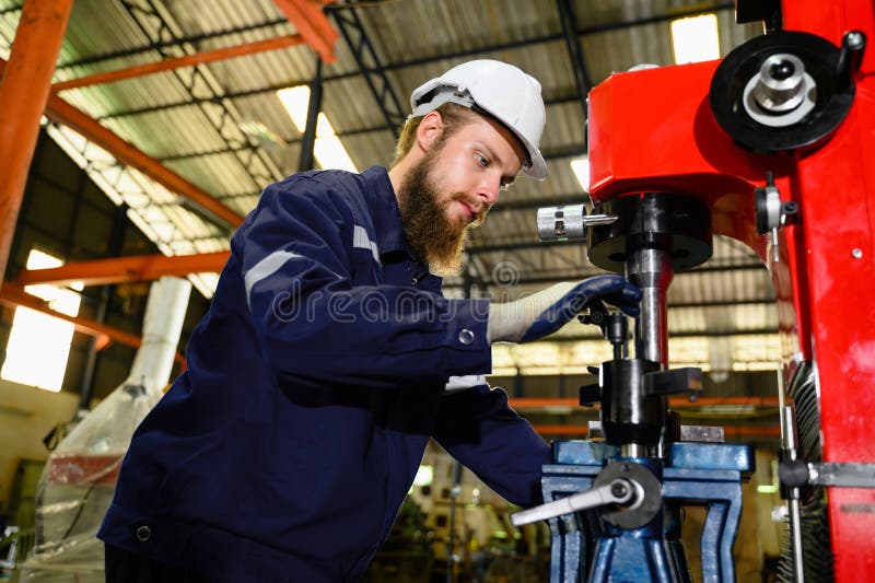 Mechanical Engineer Repairing Engine Machine at Factory Stock Photo ...