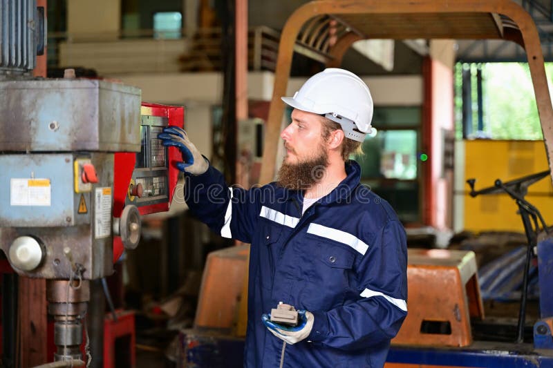 Mechanical Engineer Repairing Engine Machine at Factory Stock Image ...