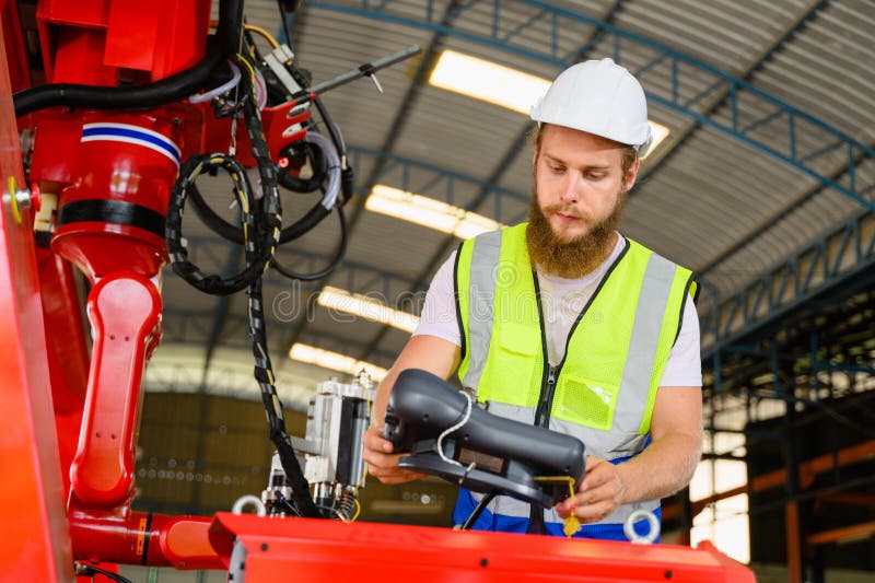 Mechanical Engineer Repairing Engine Machine at Factory Stock Photo ...