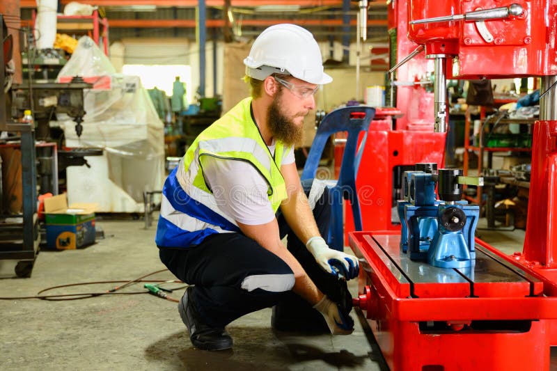 Mechanical Engineer Repairing Engine Machine at Factory Stock Image ...