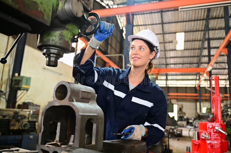 Mechanical Engineers Repairing Engine Machine at Factory Stock Photo ...