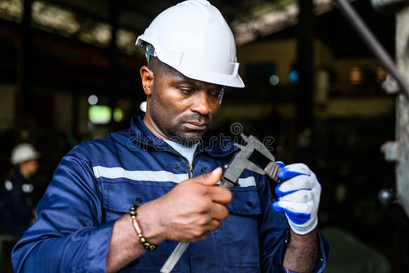 Mechanical Engineer Technician Checking and Inspecting Machine at ...