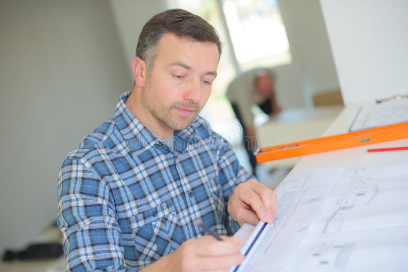 Mechanical Engineer at Work Stock Image - Image of layout, bearded ...