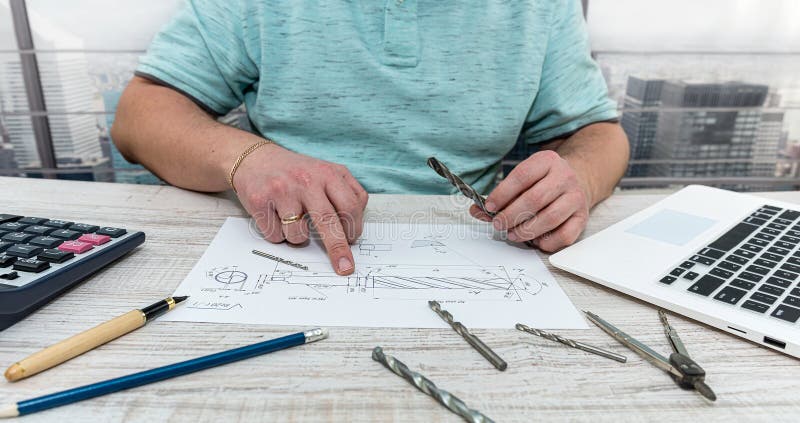 Mechanical Engineer Workig about Drawing Technical Details Drills with ...