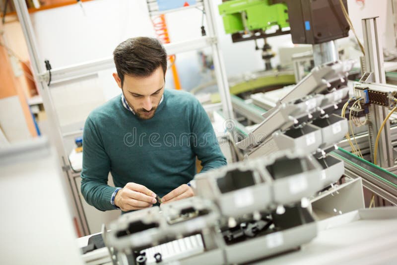 Mechanical Engineer Working on Machines Stock Image - Image of ...