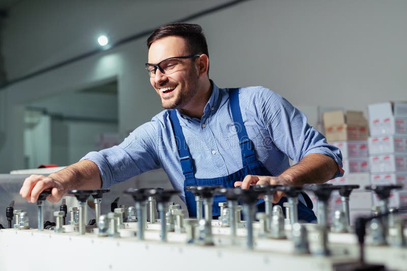 Mechanical Engineer Working on Machines. Stock Image - Image of ...