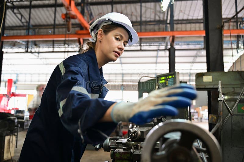 Mechanical Engineers Repairing Engine Machine at Factory Stock Photo ...