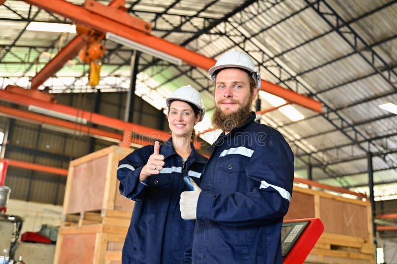 Mechanical Engineers Repairing Engine Machine at Factory Stock Photo ...