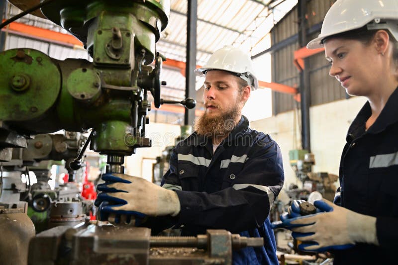 Mechanical Engineers Repairing Engine Machine at Factory Stock Photo - Image of worker ...