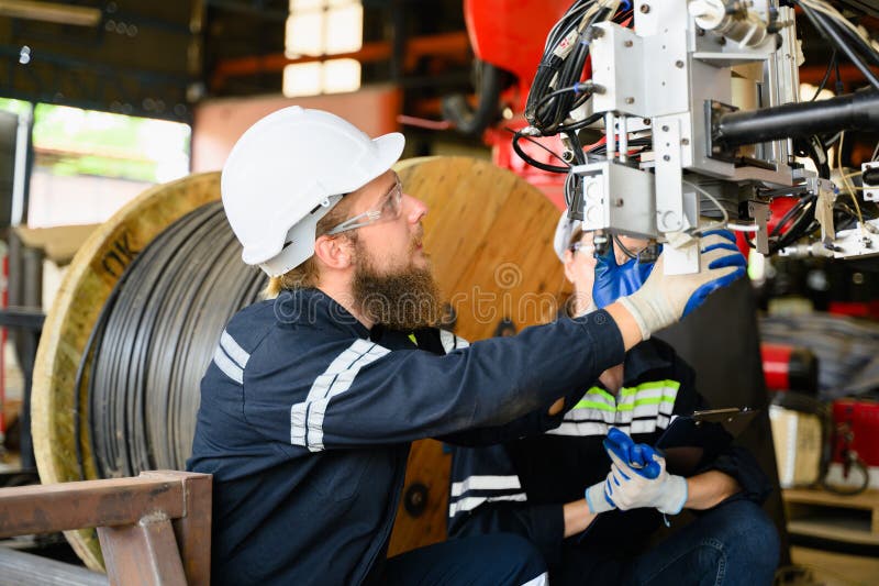 Mechanical Engineers Repairing Engine Machine at Factory Stock Image ...