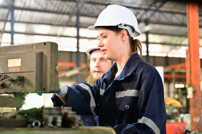 Mechanical Engineers Repairing Engine Machine at Factory Stock Image ...