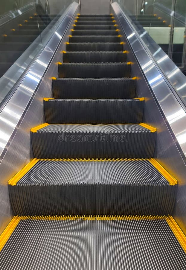 Mechanical Escalator in Building Stock Photo - Image of yellow, travel ...