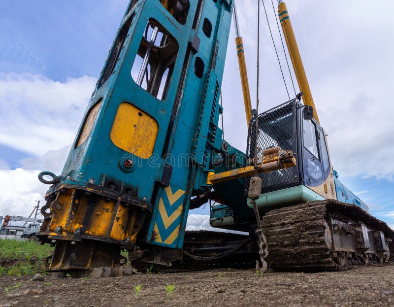 Mechanical Hammer of a Pile Driver at a Construction Site, Stock Photo ...