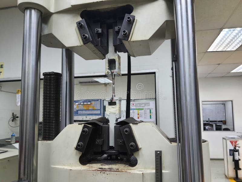 Mechanical tensile testing editorial photo. Image of engineer - 297106216