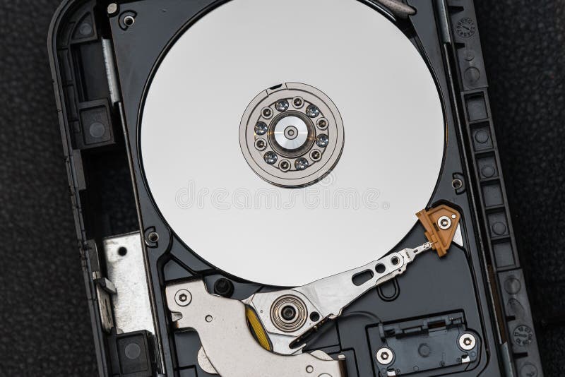 Mechanical Parts of Hard Drive Disk HDD Inside a Computer. Stock Photo ...