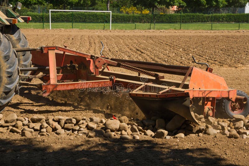 Mechanical Rake To Gather Stones of the the Land Stock Photo - Image of ...