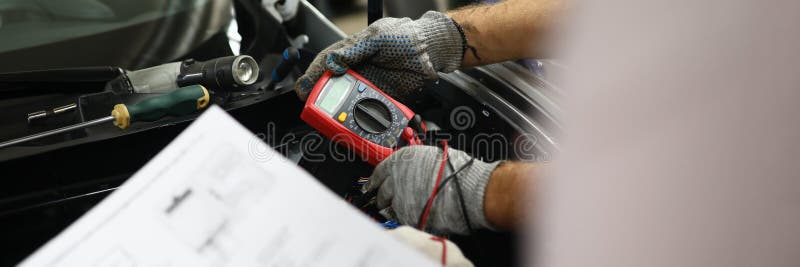 Mechanical Service Using Multimeter To Check Voltage Level in Car ...
