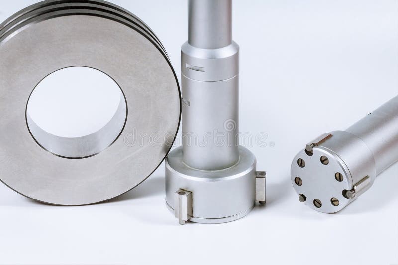 Mechanical Three-Point Internal Micrometer with Setting Ring on a White ...