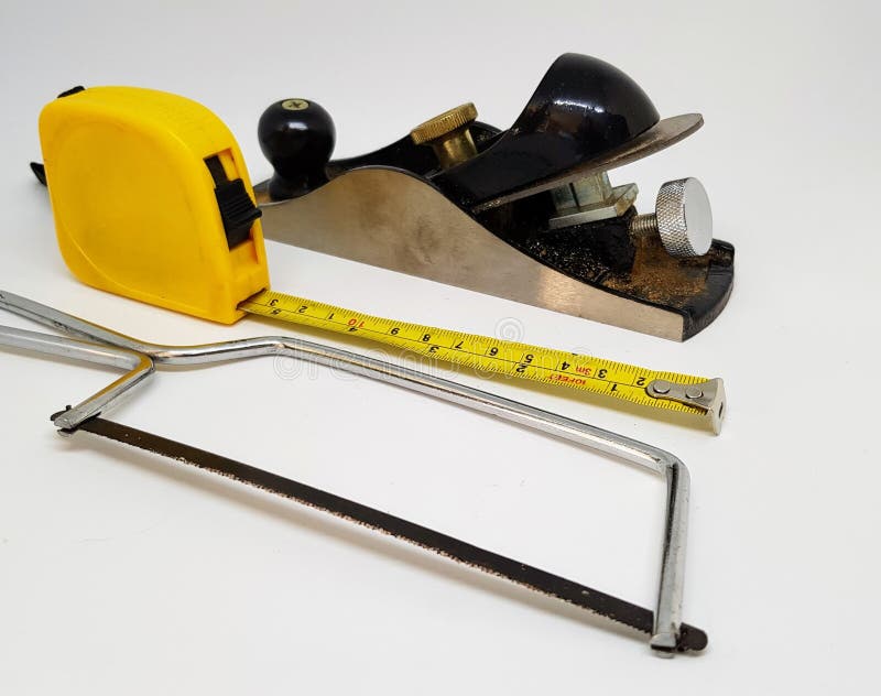 Mechanical Tools, Including a Measuring Tape, Next To Each Other on a ...