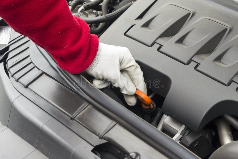 Mechanician Performing Maintenance on a Car Engine Stock Photo - Image ...
