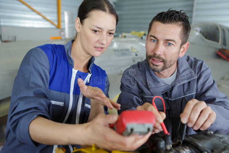 Two Mechanics Discussing Problem Stock Image - Image of occupation ...