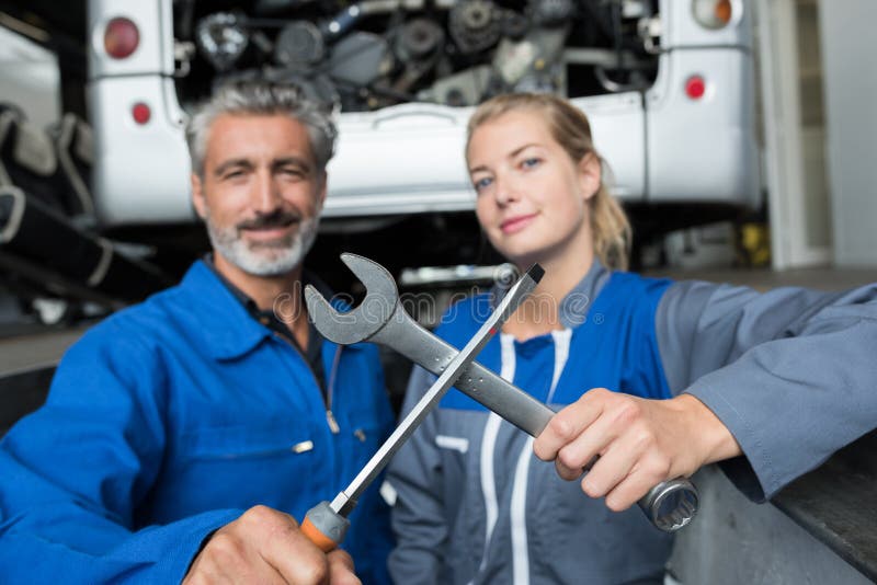 Mechanics Posing in Playful Pose Stock Photo - Image of work, workplace ...