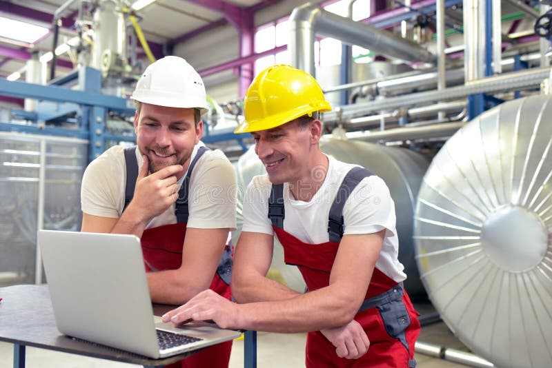 Mechanics Repair a Machine in a Modern Industrial Plant - Profession ...