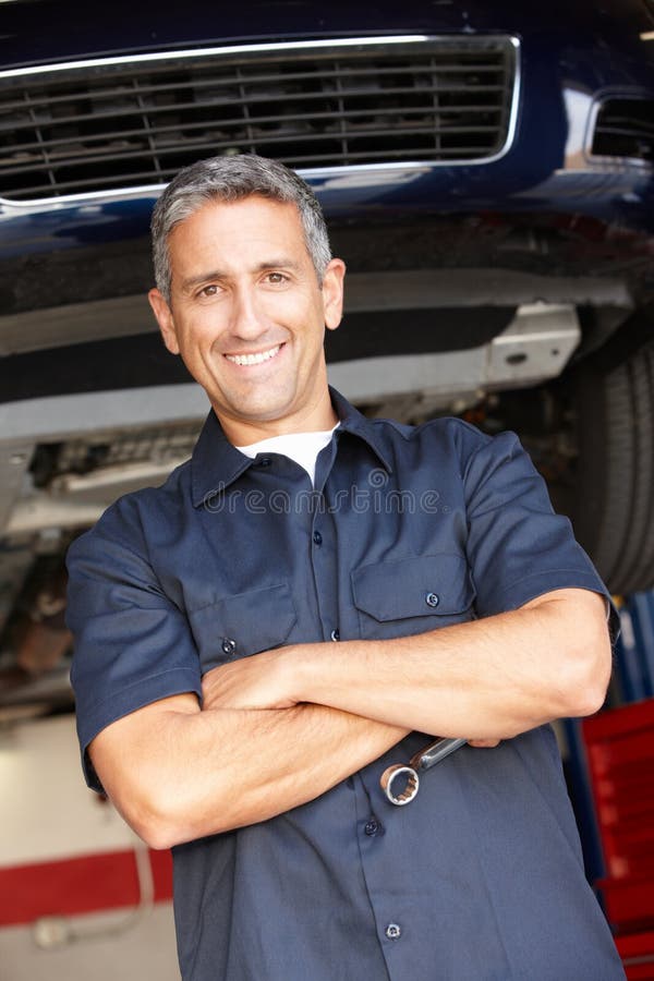Portrait Confident Male Automobile Mechanic Standing Front Car Workshop ...