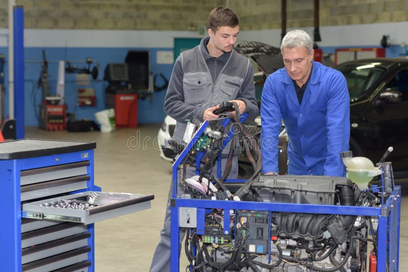 Mechanics Training Class with Teacher and Student Stock Image - Image ...