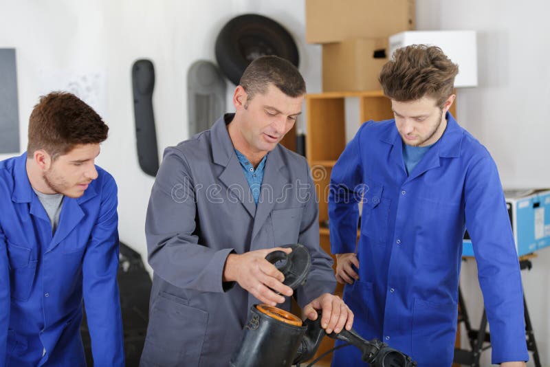 Mechanics Training Class with Teacher and Students Stock Image - Image ...