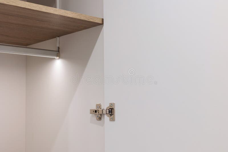 The Mechanism of an Open Wardrobe for Clothes in the INTERIOR Stock ...