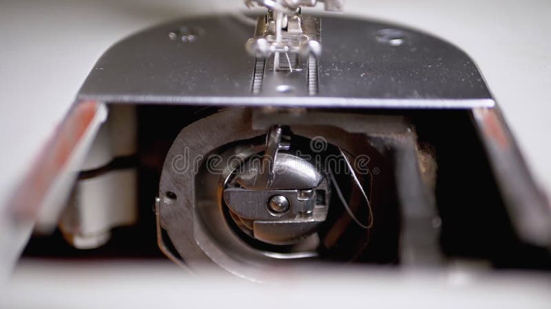 Mechanism of Operation of the Sewing Machine. Shuttle Hook System. Slow ...