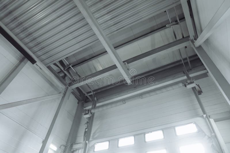 Mechanism of Sectional Overhead Gate Inside a Cargo Garage Stock Photo ...