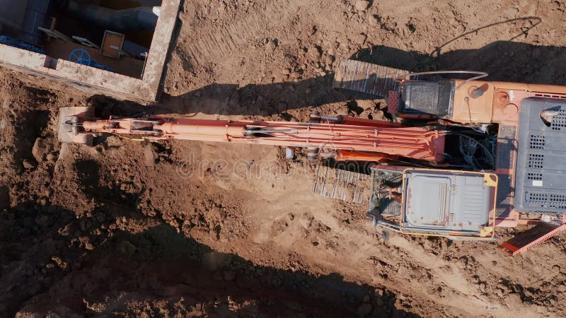 Mechanization of Construction Works. a Full-rotary Excavator Digs a ...