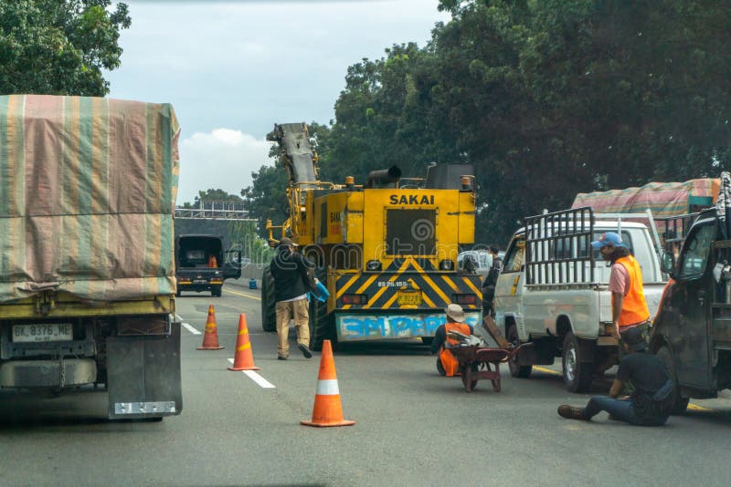 Construction Roadworks at the Highway. Freeway Maintenance Workers ...