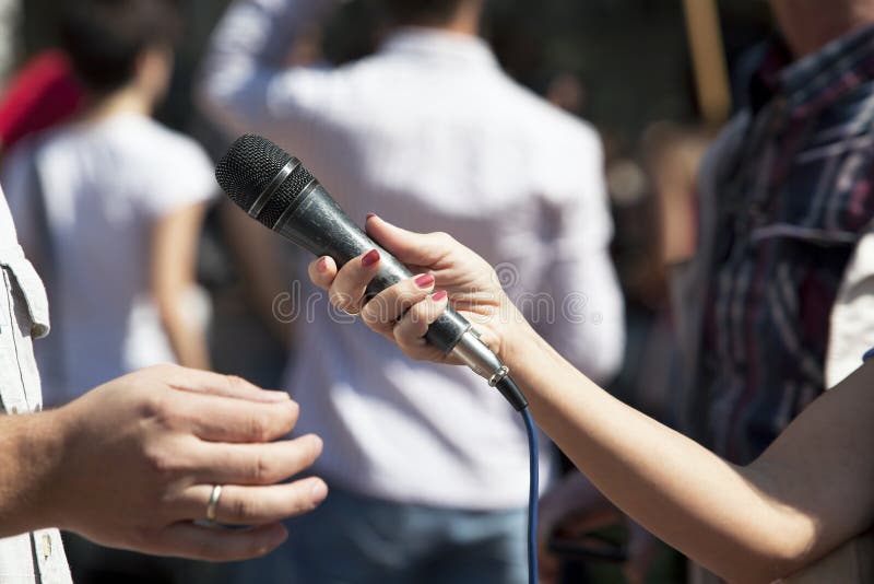 Media interview stock photo. Image of microphone, holding - 32868926