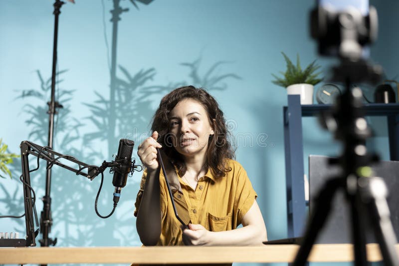 Media Star in Studio Filming Tech Tutorial on How To Do Maintenance on ...