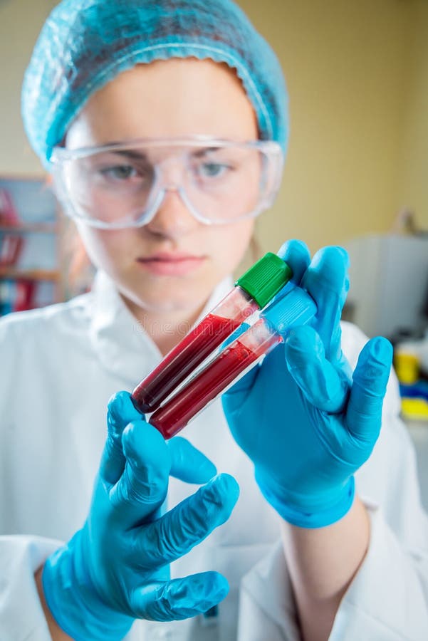 Medic Staff at Work in the Laboratory. Background. Stock Image - Image ...